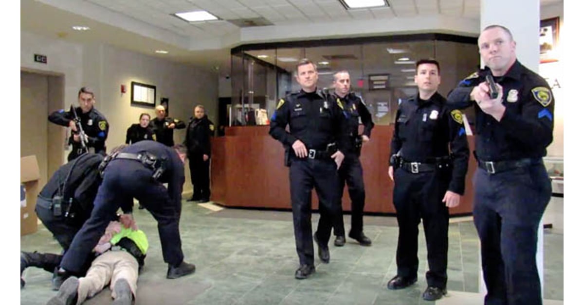 Video shows heated confrontation when armed men enter Dearborn police ...